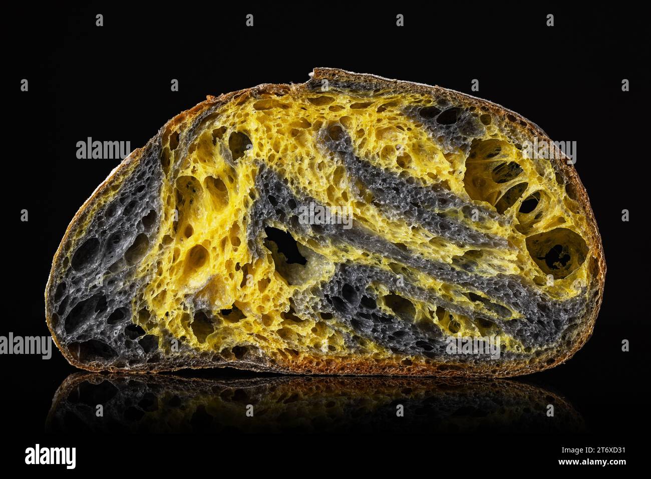 Homemade Slice of sourdough black bread with pumpkin turmeric oven ...