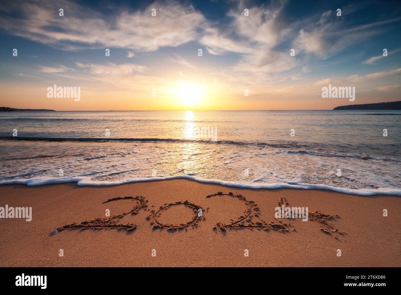 Happy New Year 2024 concept, lettering on the beach. Written text on ...