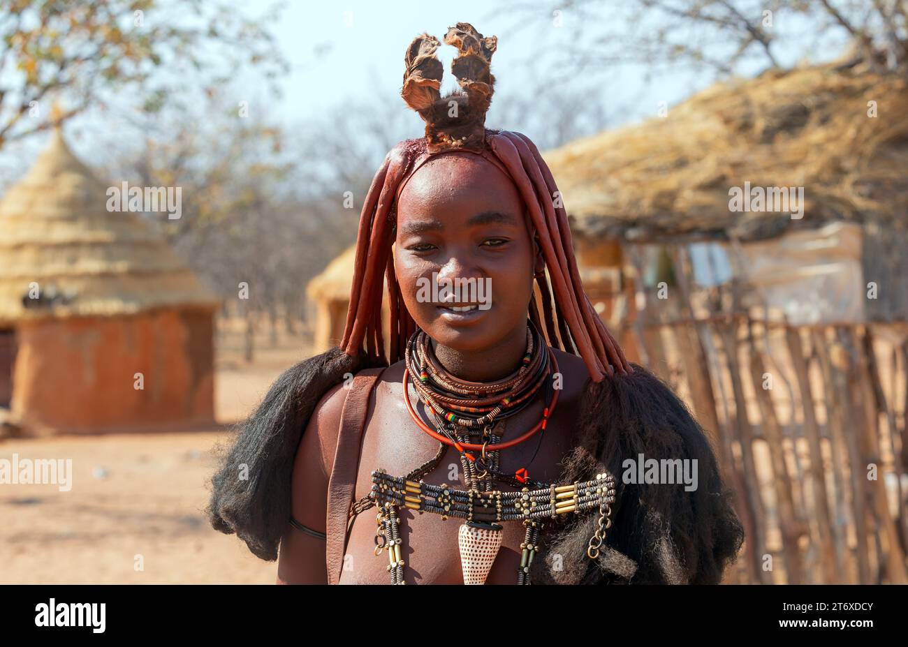 Rural Namibia - August 22, 2023: Portrait of a Himba woman dressed in ...