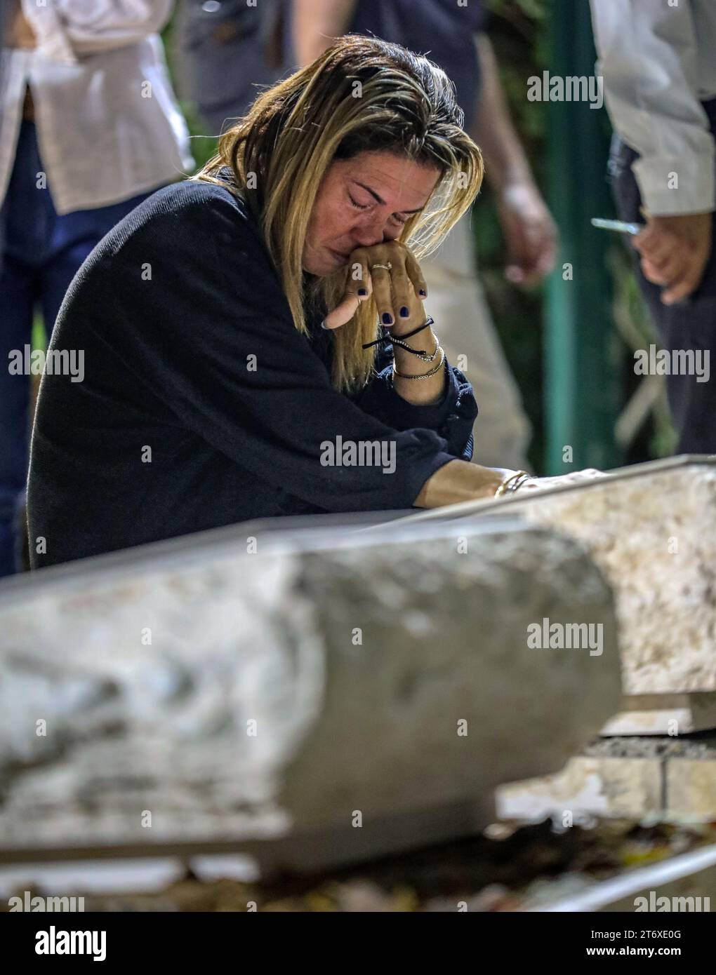 Jerusalem, Israel. 12th November 2023. woman mourns over the graves of ...