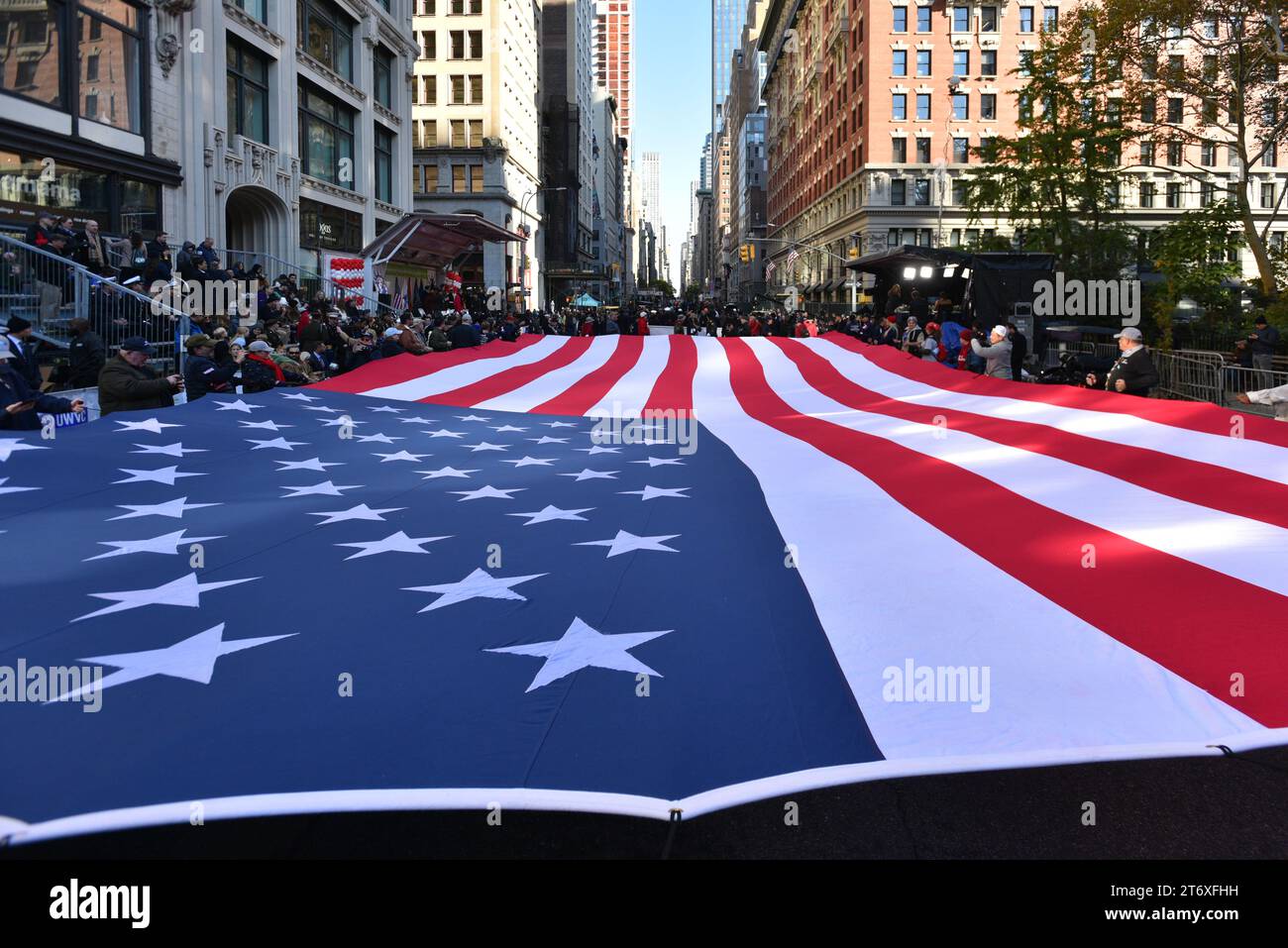 Volunteers carry the Ground Zero Flag during the 104th annual New York ...