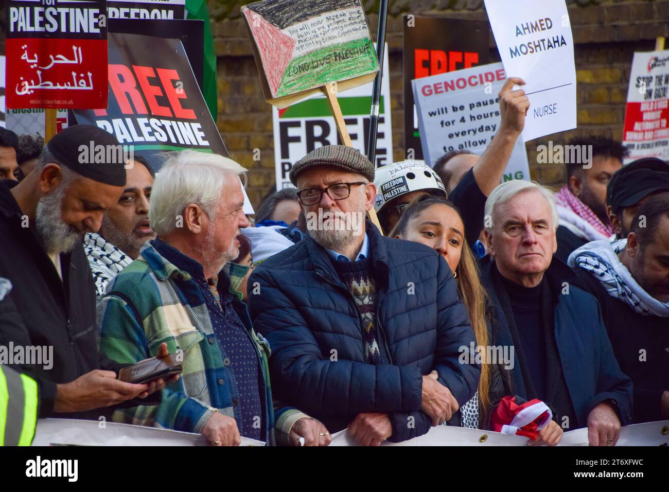 London, UK. 11th November 2023. Jeremy Corbyn and Labour MP John ...