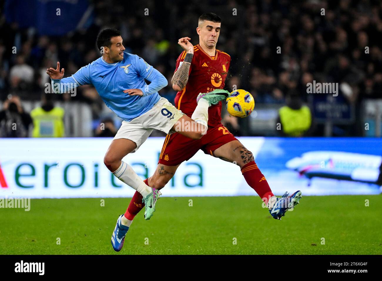 Pedro Eliezer Rodríguez Ledesma of SS Lazio and Gianluca Mancini of AS ...