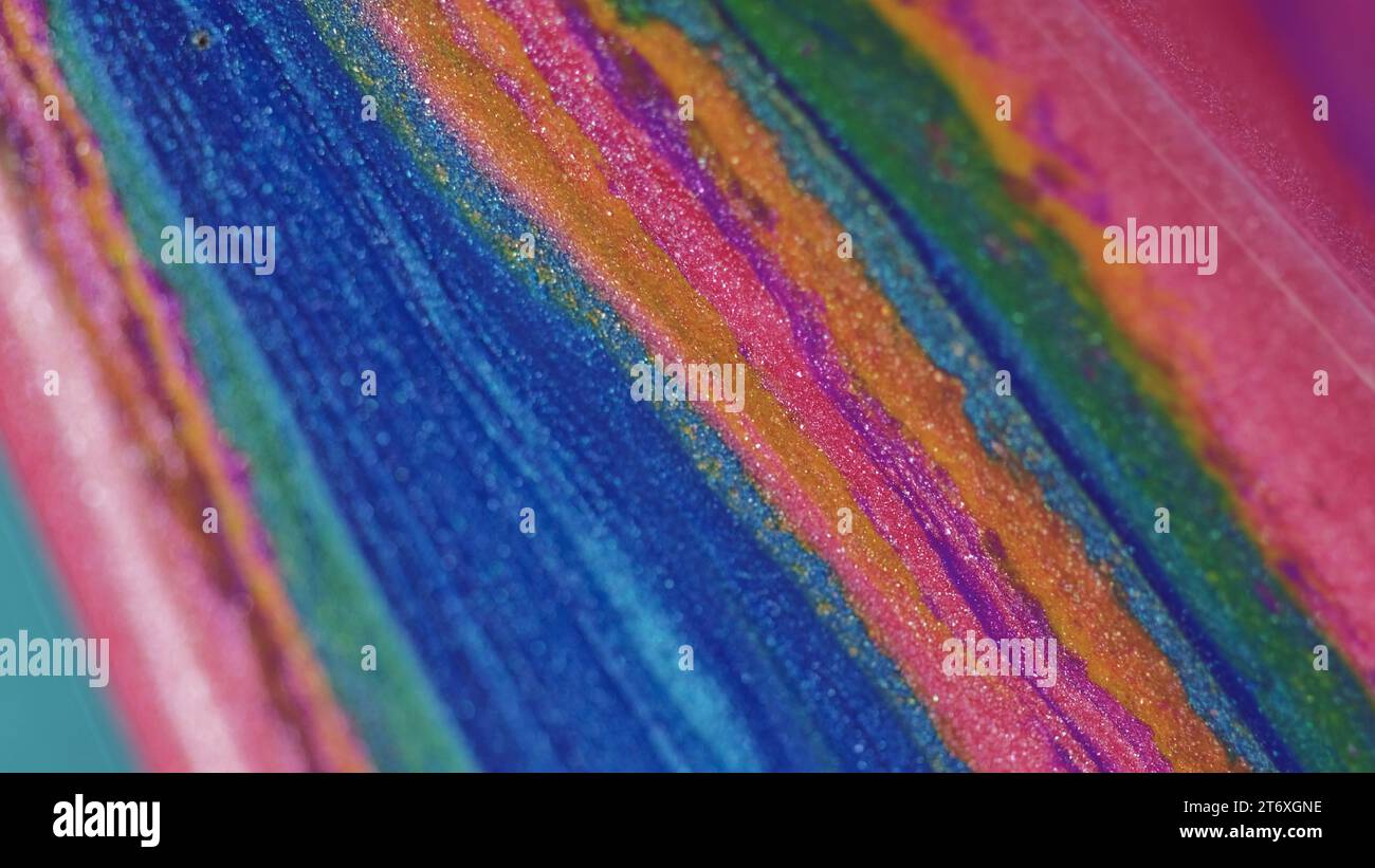Glitter ink water paint spill color metallic fluid Stock Photo - Alamy