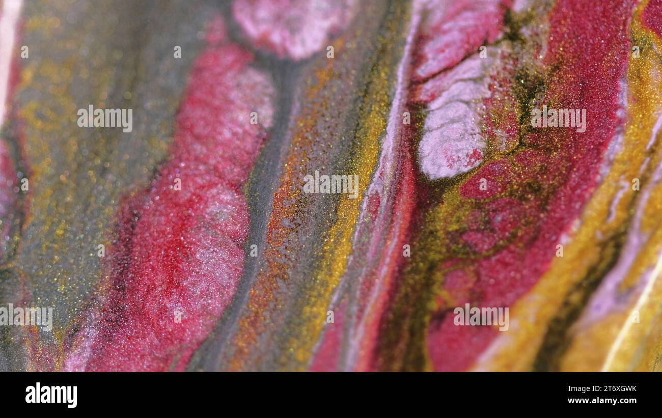 Shiny fluid spill glitter ink hi-res stock photography and images - Alamy