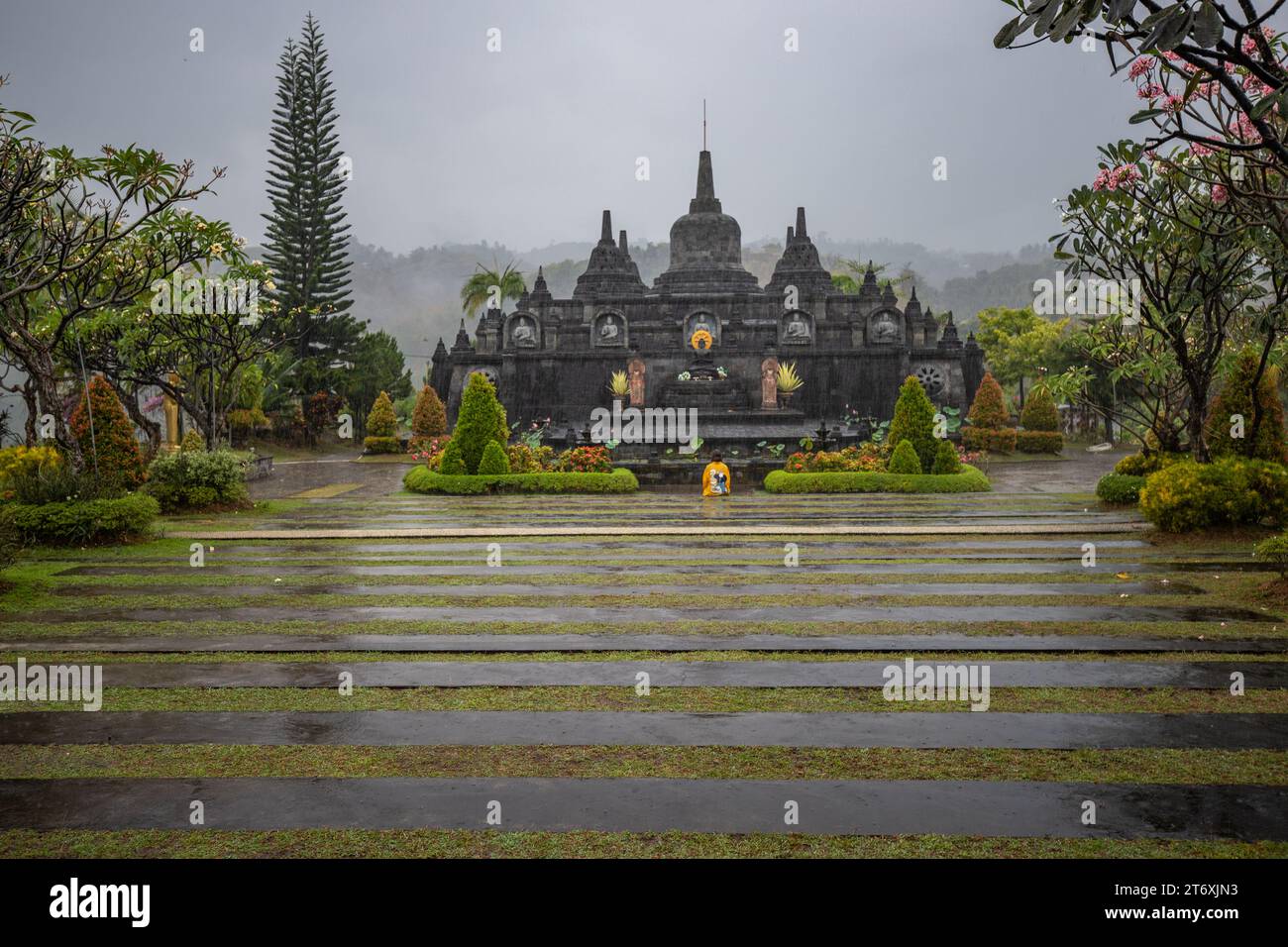 A Buddhist temple in the evening in the rain. The Brahmavihara-Arama ...