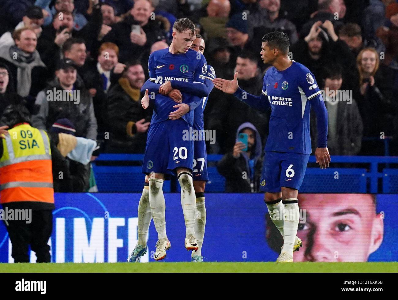 Chelsea's Cole Palmer (left) celebrates with team-mates after scoring ...