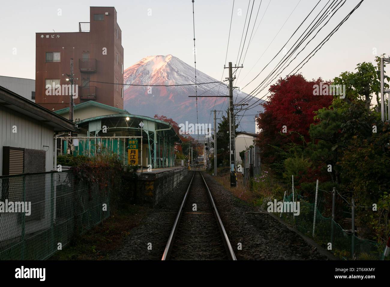 Views of Mount Fuji at dawn from the streets of the city of Fujiyoshida ...