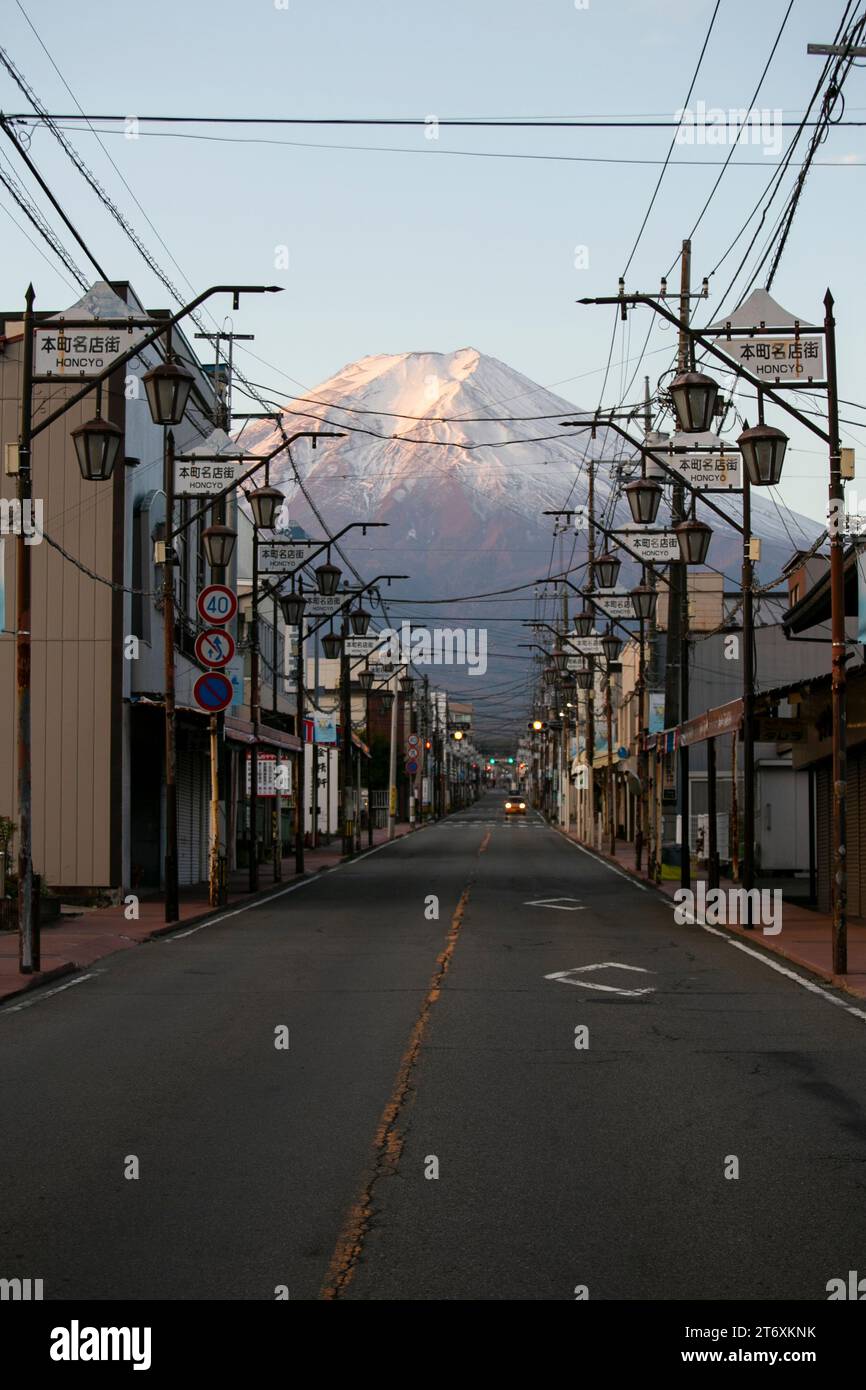 Views of Mount Fuji at dawn from the streets of the city of Fujiyoshida ...