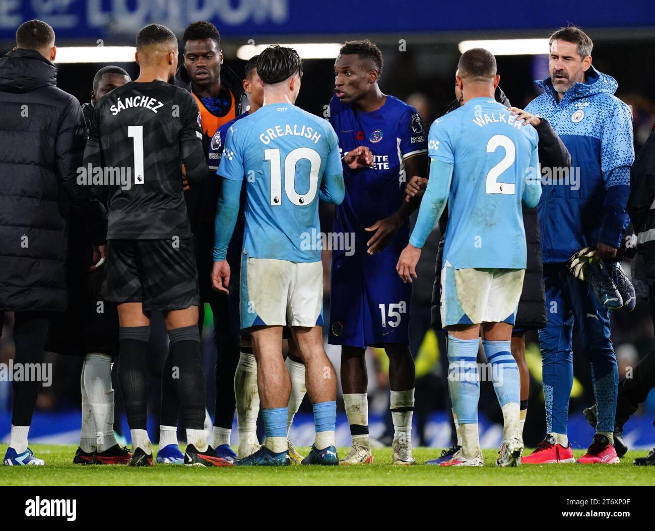 Chelsea's Nicolas Jackson speaks with Manchester City's Jack Grealish ...