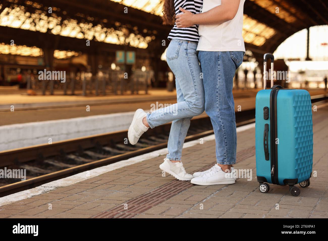 Long-distance relationship. Couple on platform of railway station, closeup Stock Photo - Alamy