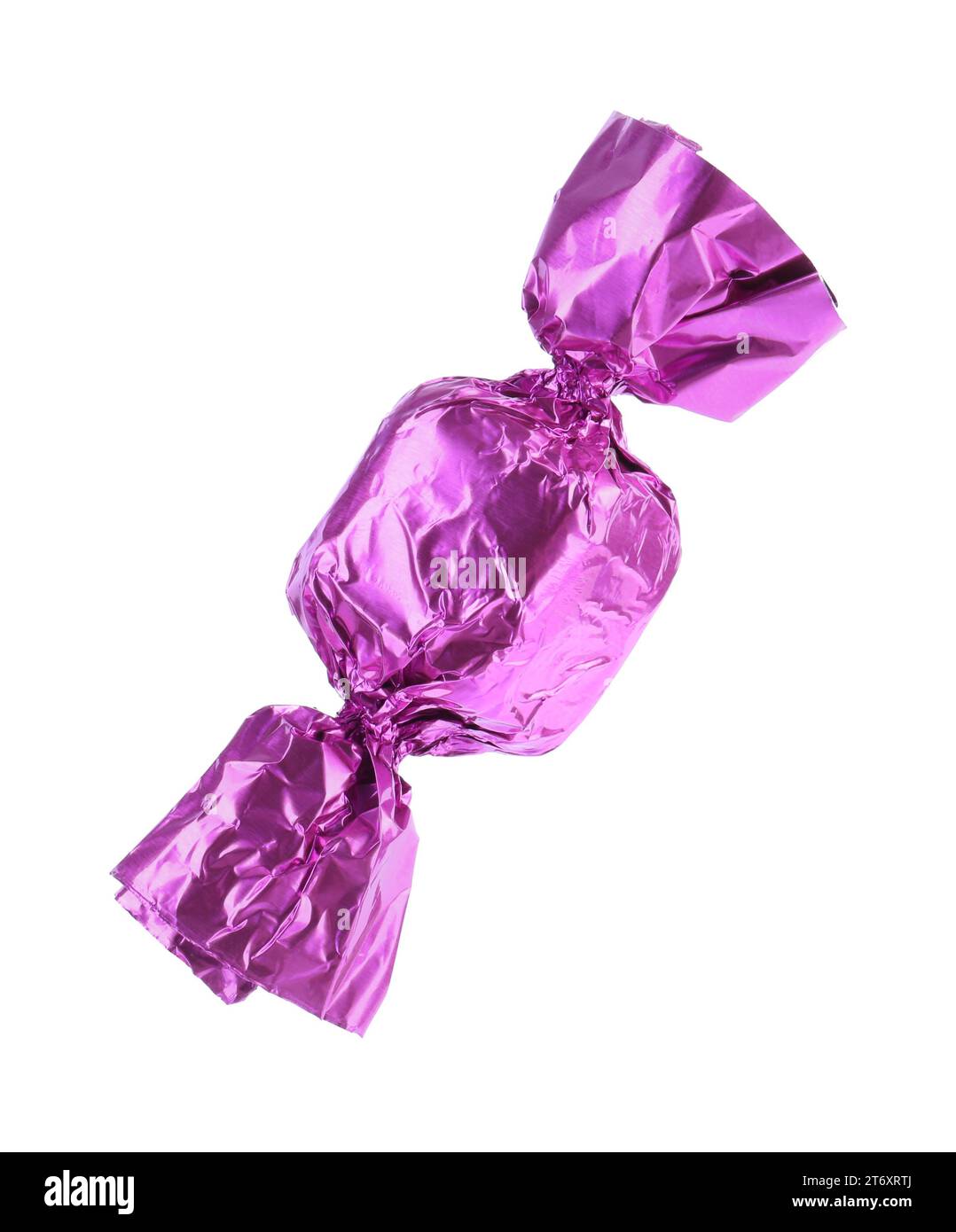 Tasty candy in violet wrapper isolated on white Stock Photo - Alamy