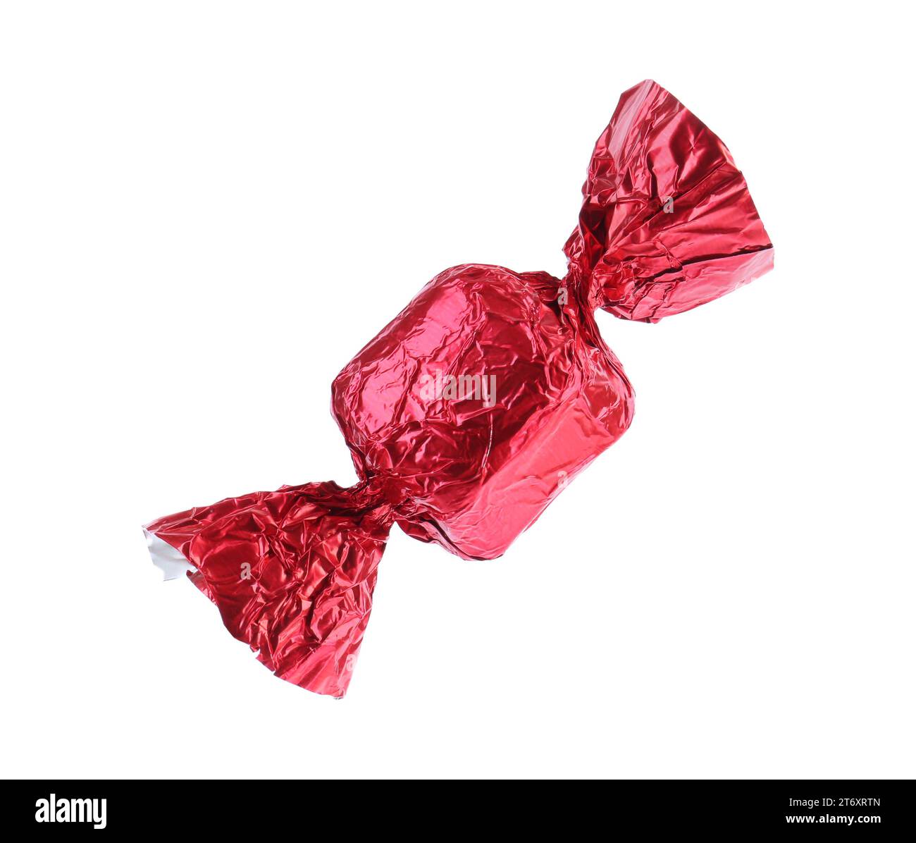Tasty candy in red wrapper isolated on white Stock Photo - Alamy