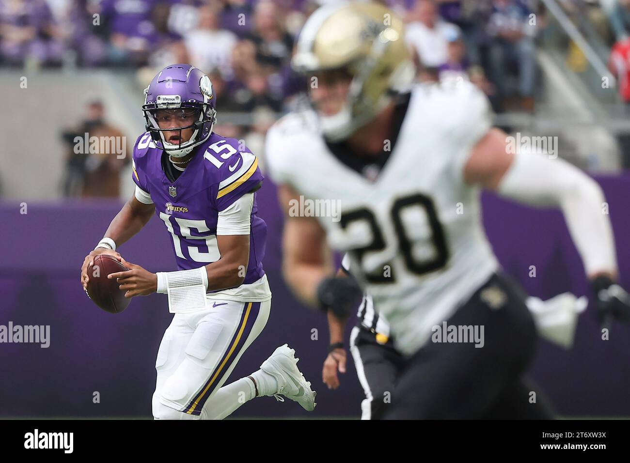 Minnesota Vikings quarterback Joshua Dobbs (15) rolls out during the ...