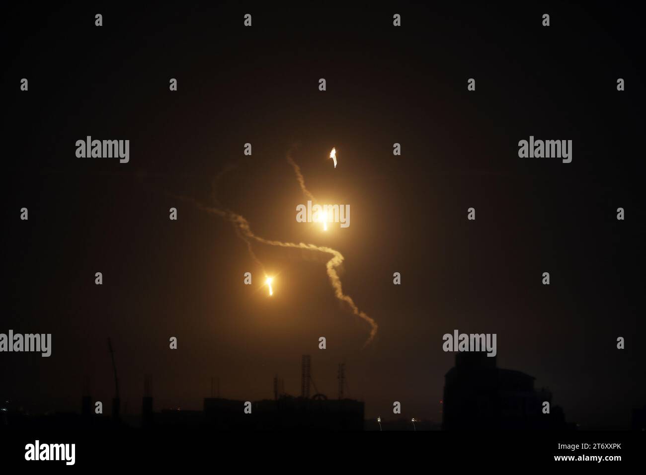 Flares are fired by Israeli troops over Khan Yunis in the southern Gaza ...