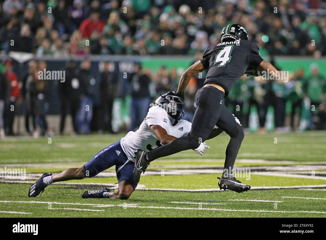 Marshall wide receiver DeMarcus Harris (4) is defended by Georgia ...