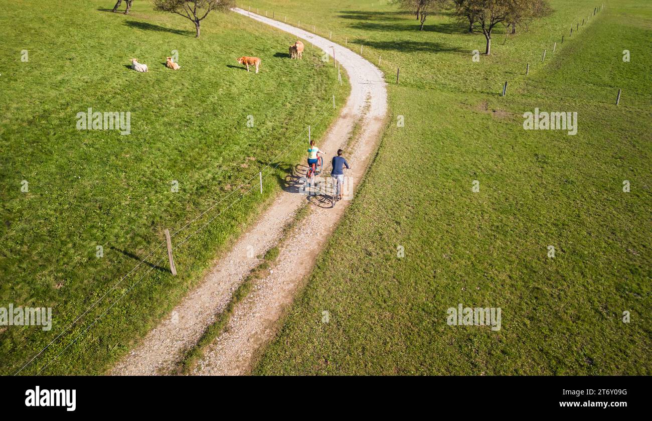 Recreational bike ride of two cyclists with a fantastic view of ...