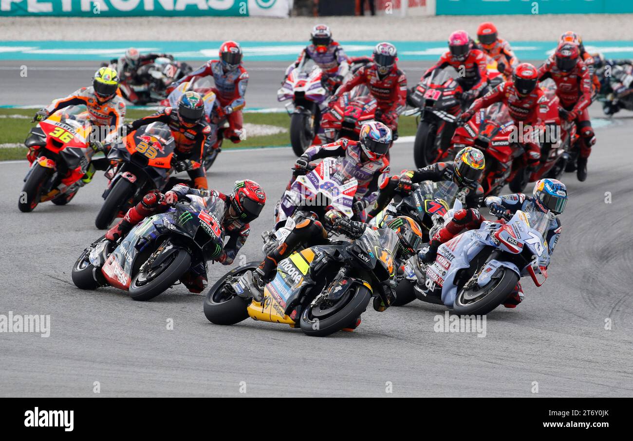 Spanish rider Alex Marquez of Gresini Racing MotoGP (R) leads the pack ...