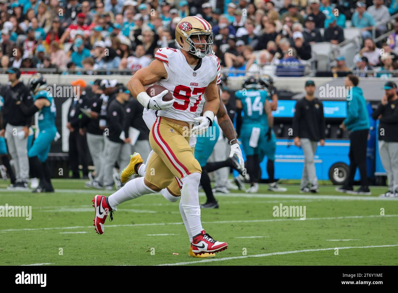 San Francisco 49ers defensive end Nick Bosa (97) runs to the end zone ...