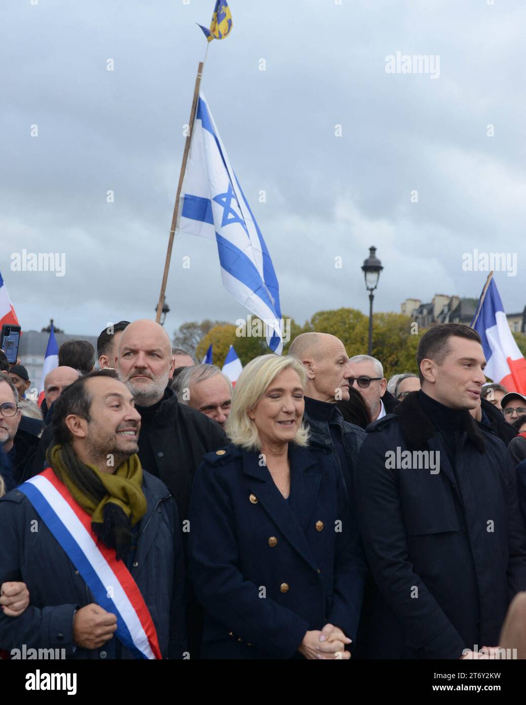 Sebastien Chenu, Marine Le Pen and Jordan Bardella during March against ...