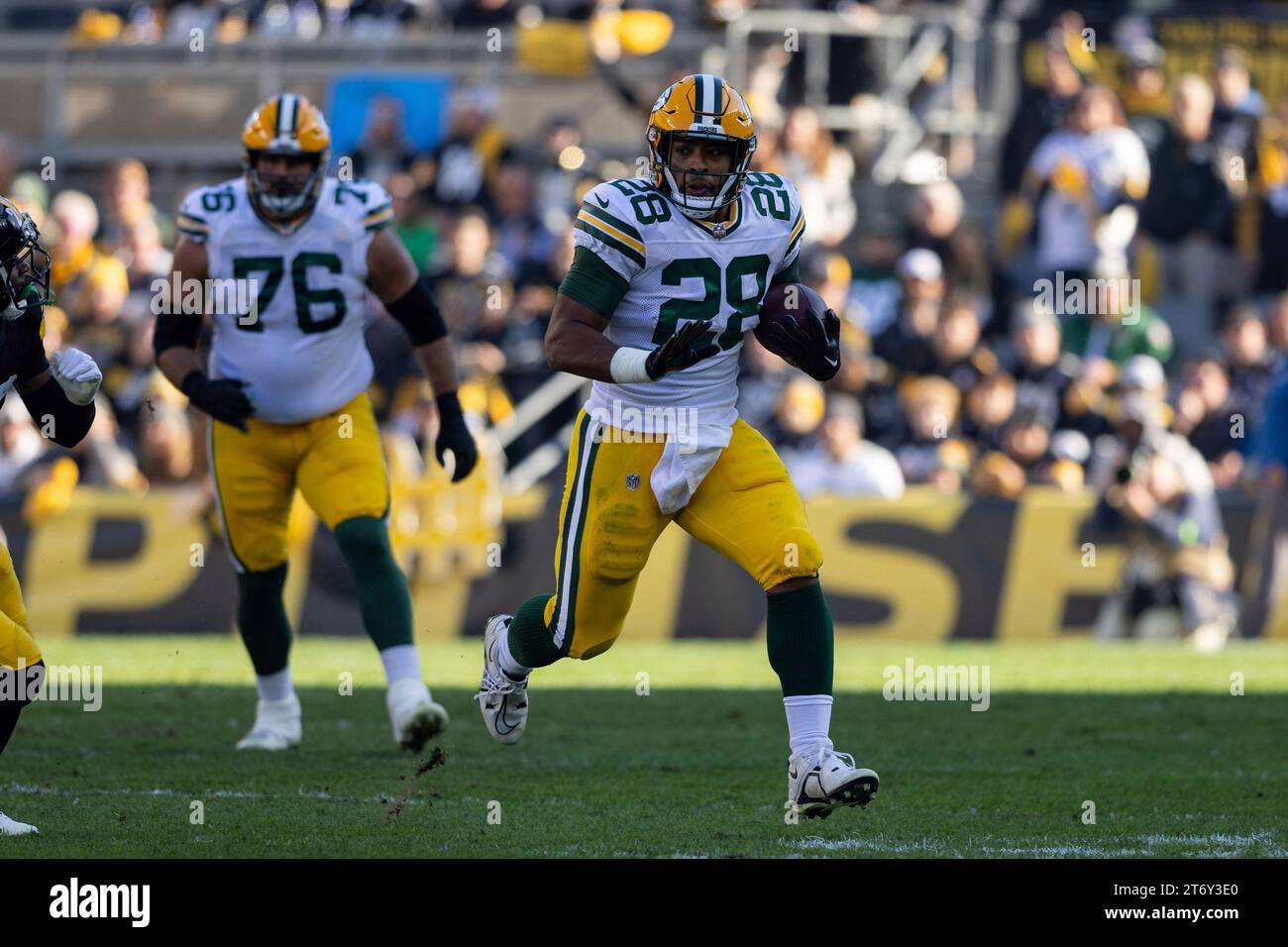Green Bay Packers running back AJ Dillon (28) rushes during an NFL ...