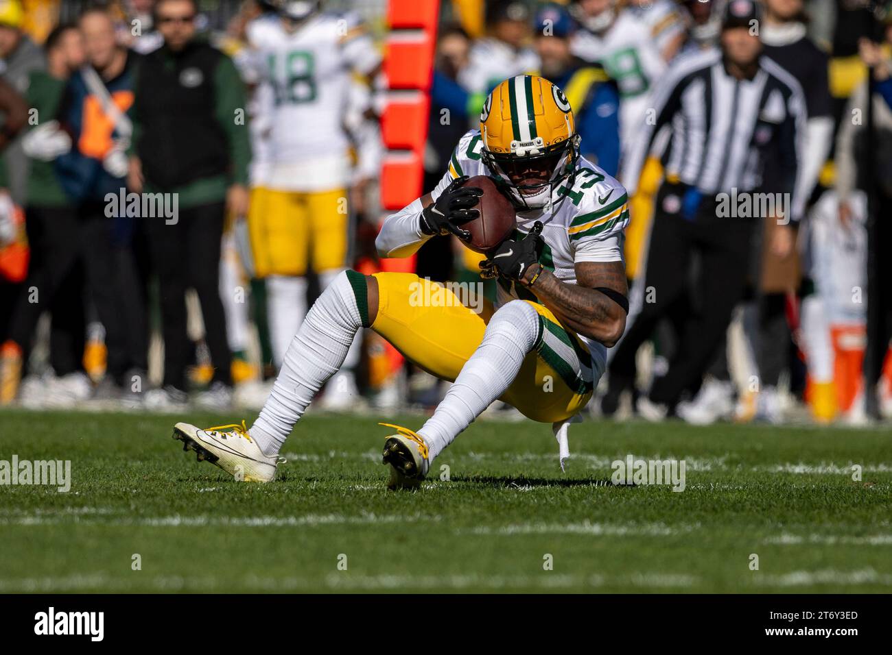 Green Bay Packers wide receiver Dontayvion Wicks (13) catches a pass ...