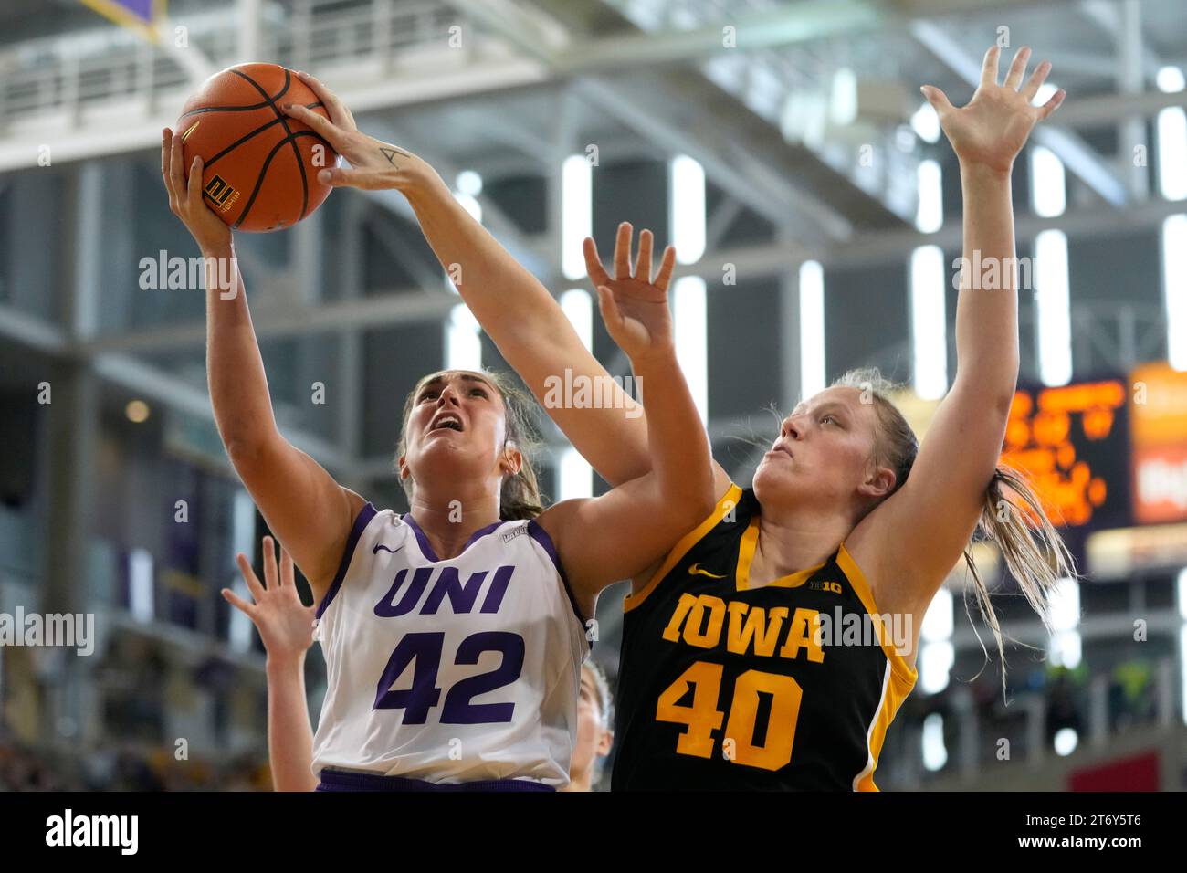 Iowa center Sharon Goodman (40) blocks a shot by Northern Iowa forward ...