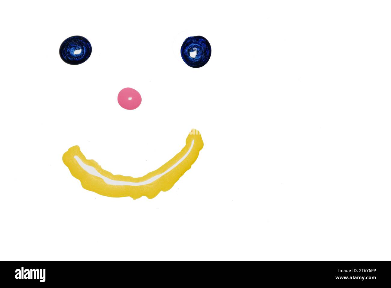 Smiley face vibrantly created using nail polish, relates to happiness ...