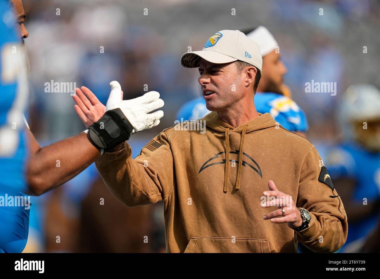 Los Angeles Chargers head coach Brandon Staley talks to players as they ...