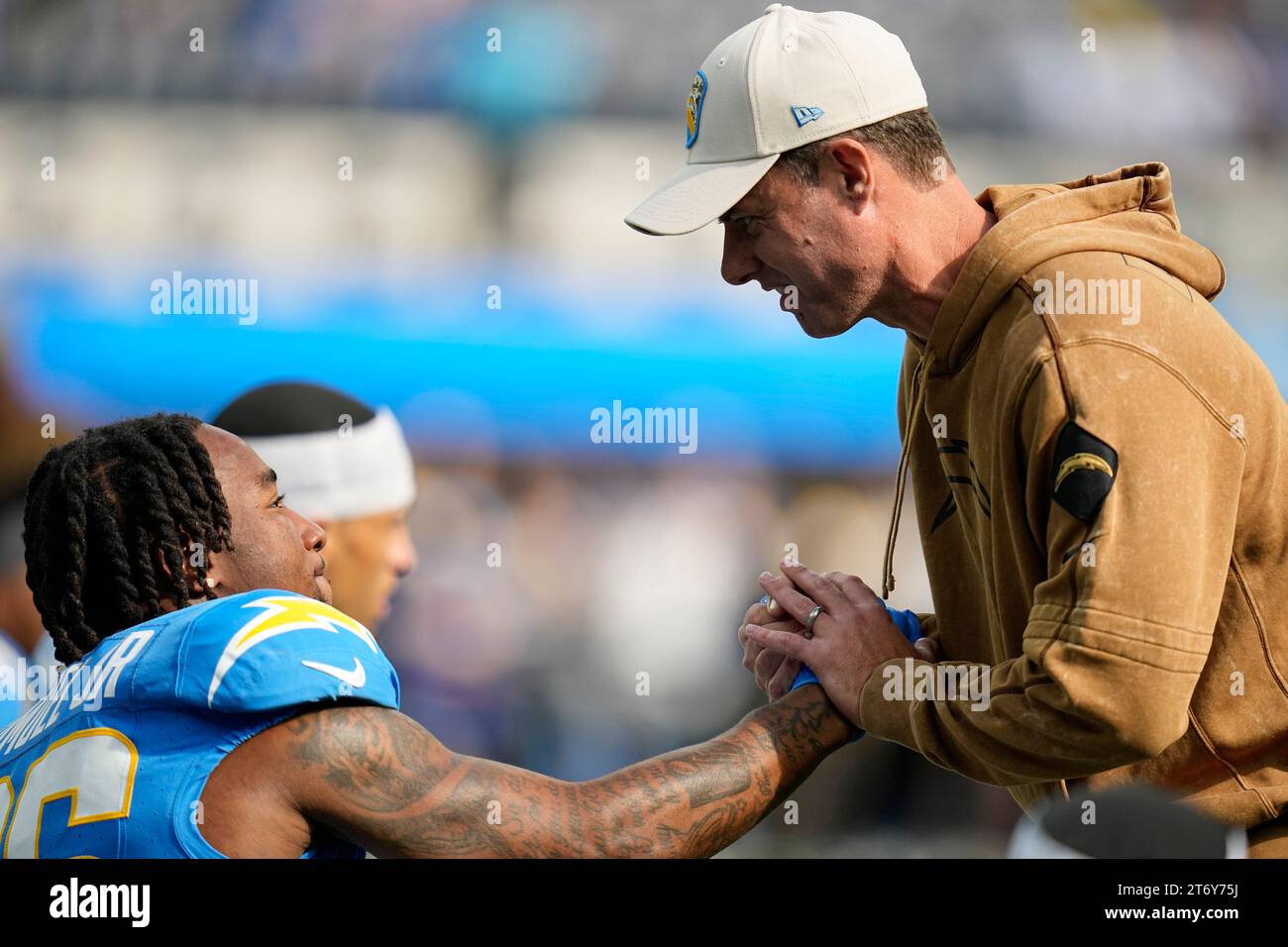 Los Angeles Chargers head coach Brandon Staley talks to players as they ...