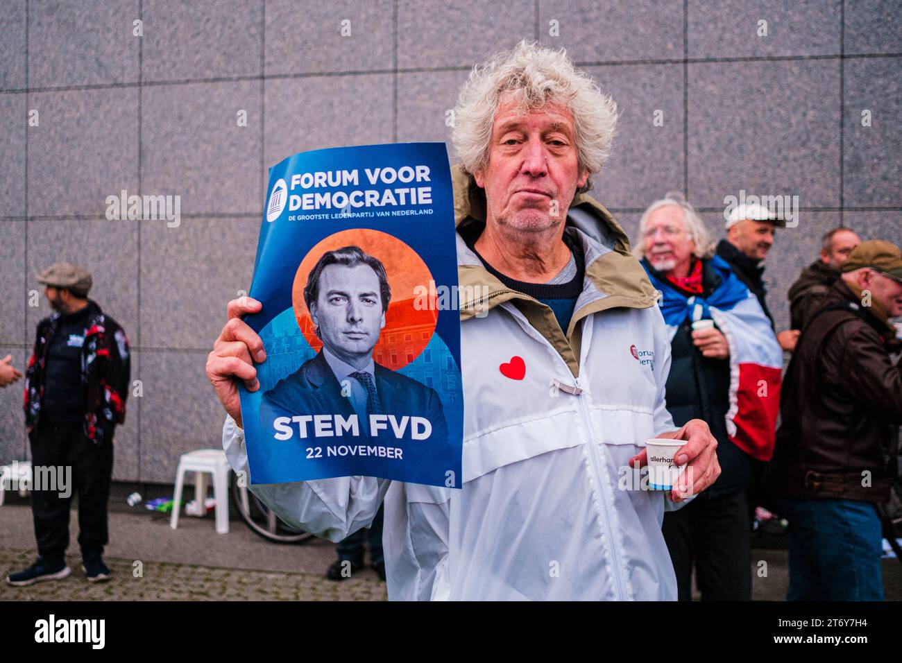 Amsterdam, The Netherlands. 12th November 2023. A man holding up a ...