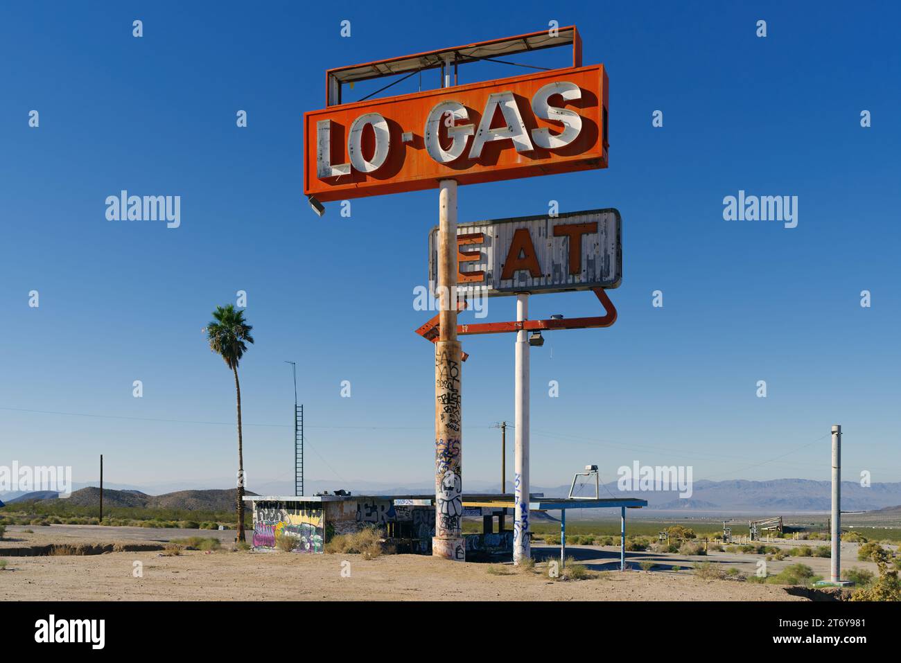 Abandoned gas station and restaurant signs shown along the I-15 in ...