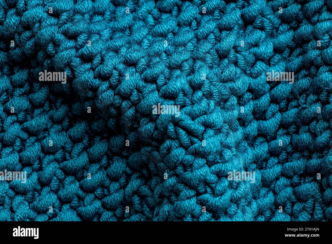 Simple blue wavy background made of large knitted thread, trend and ...