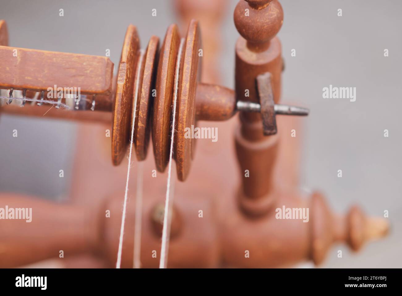 The retro design of the spinning wheel adds a vintage touch to the ...