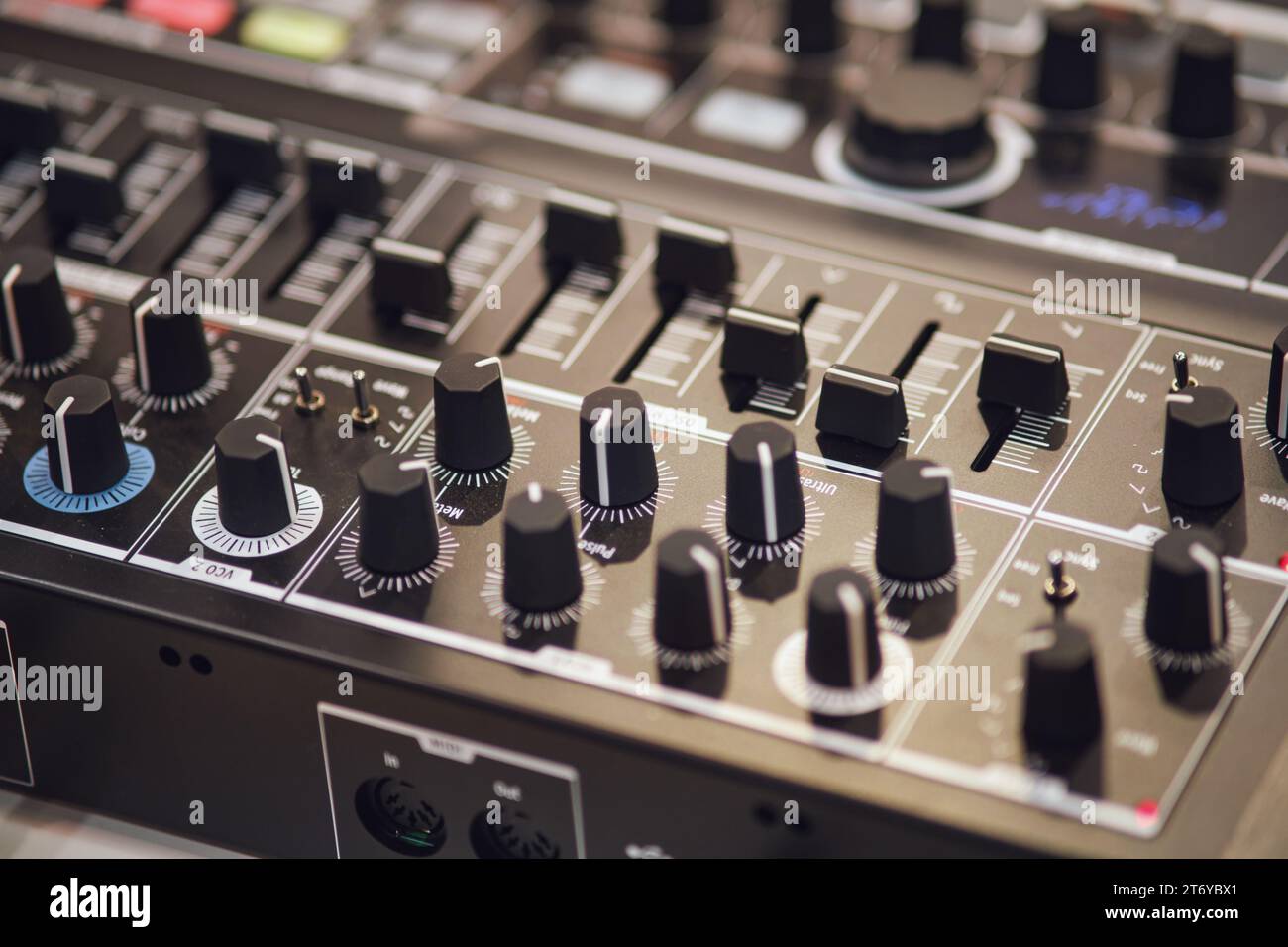 Audio mixing console close-up. Audio equipment in a recording studio ...