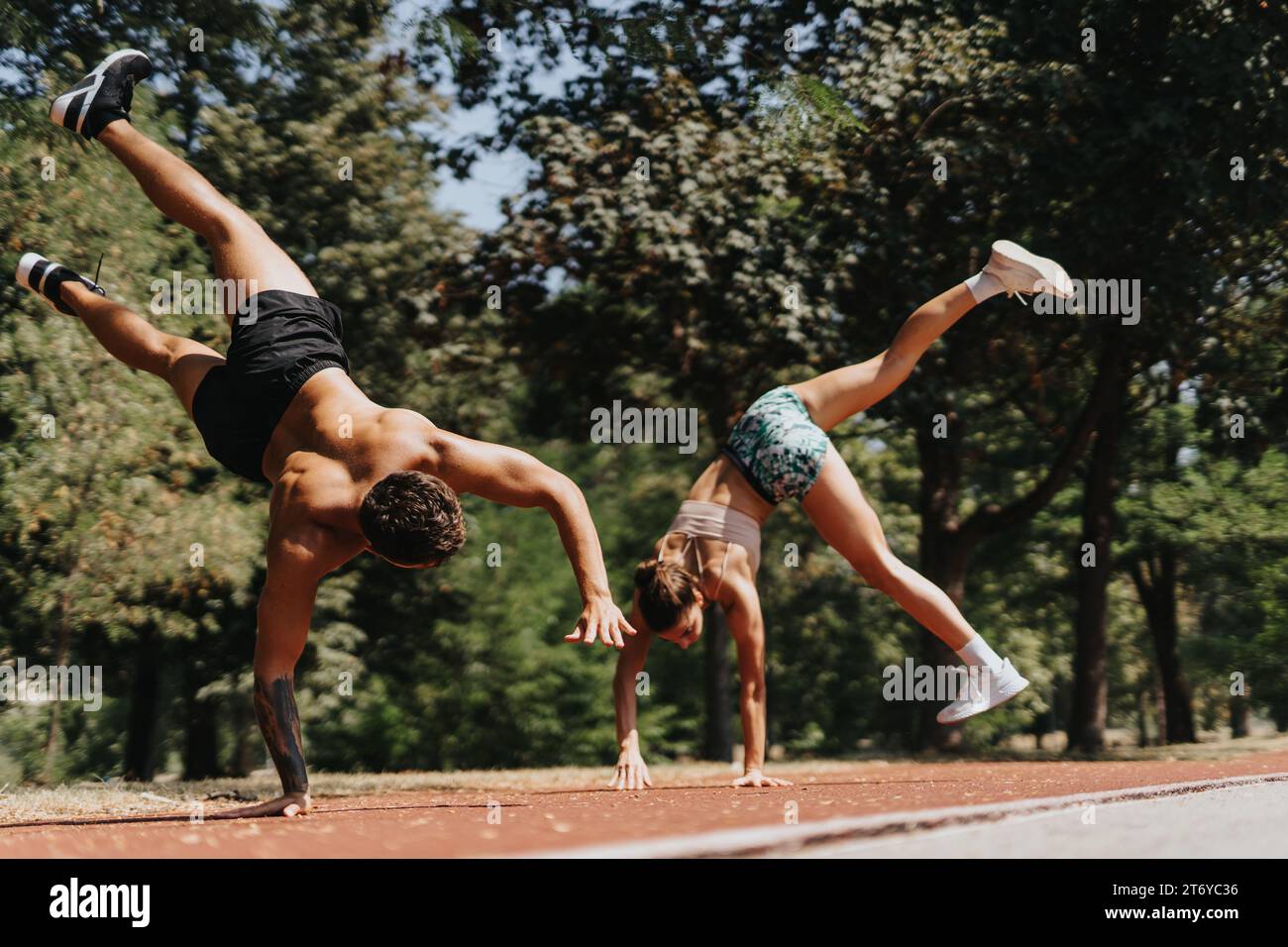 Sportspeople doing cartwheel hi-res stock photography and images - Alamy