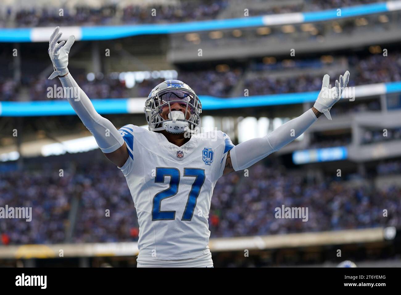 Detroit Lions safety Tracy Walker III (21) gets the crowd involved ...