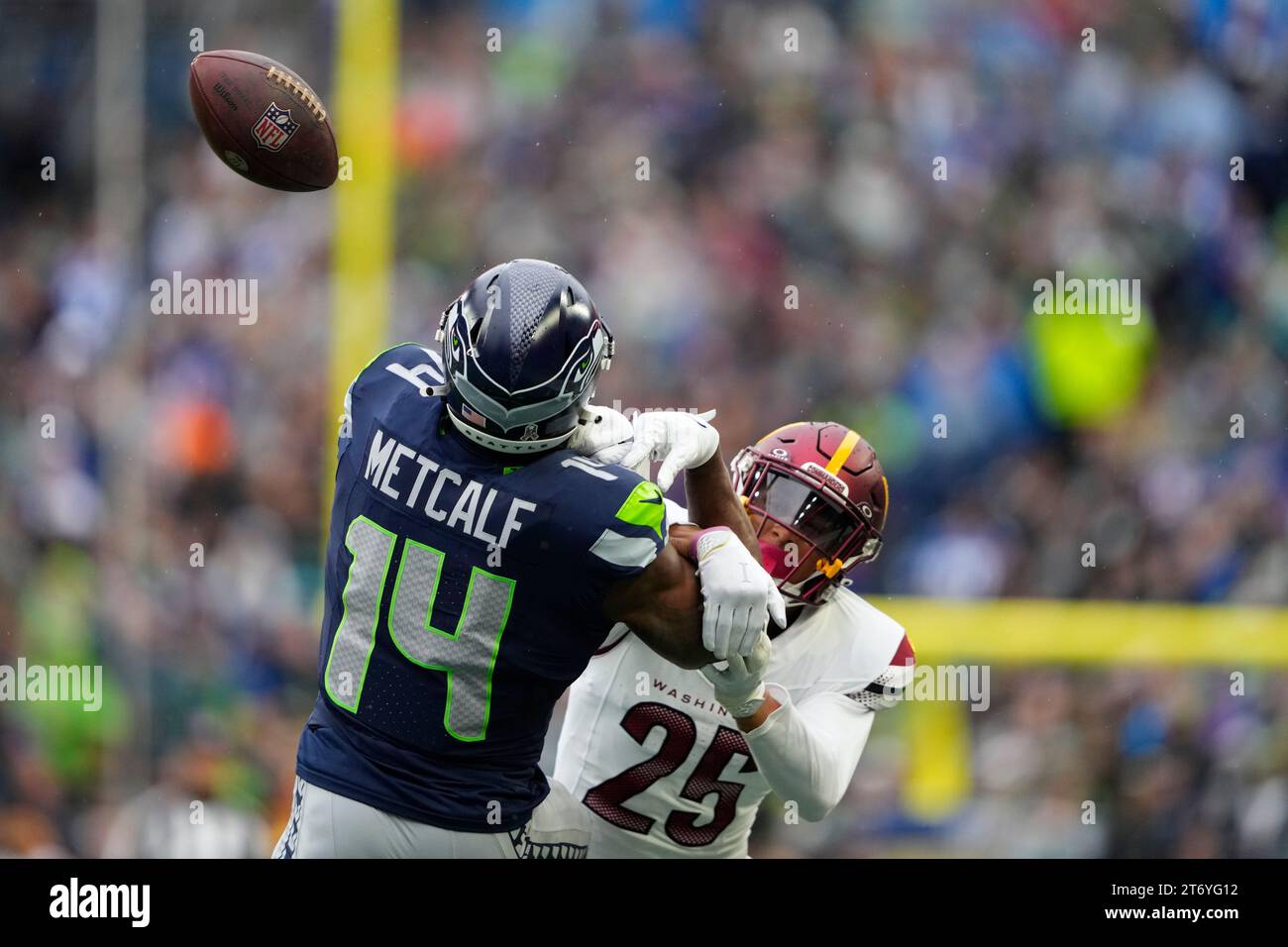 Washington Commanders cornerback Benjamin St-Juste (25) breaks up a ...