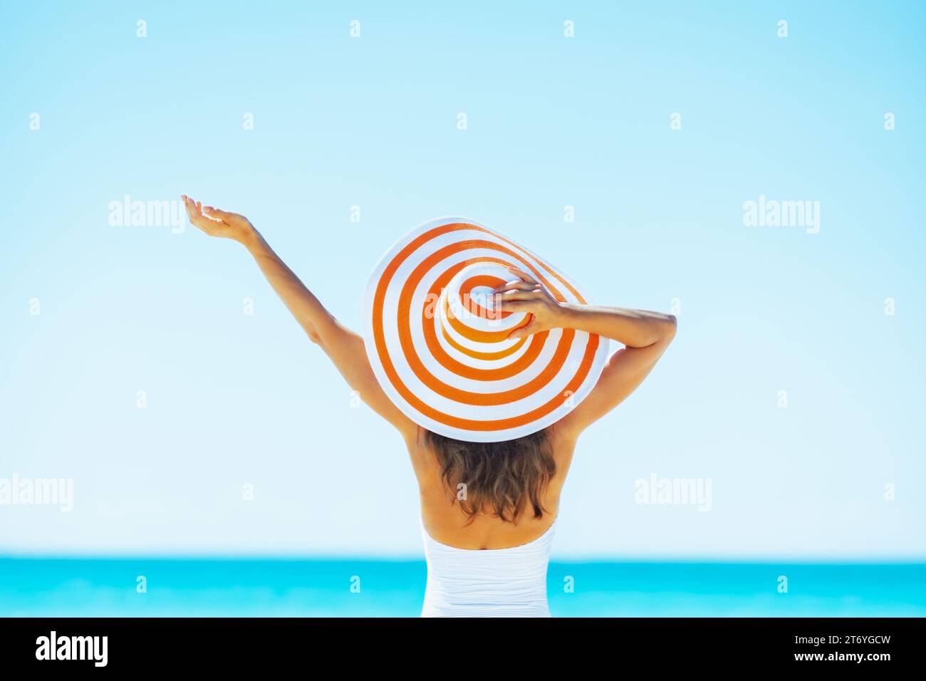 Woman in bikini on beach back view hi-res stock photography and images ...