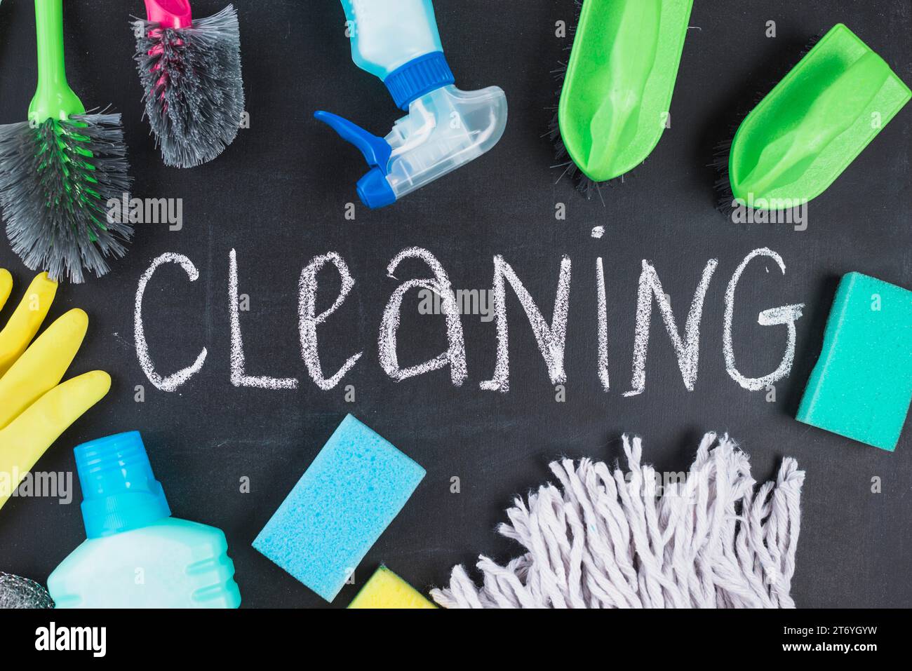 Cleaning text surrounded with equipments blackboard Stock Photo - Alamy