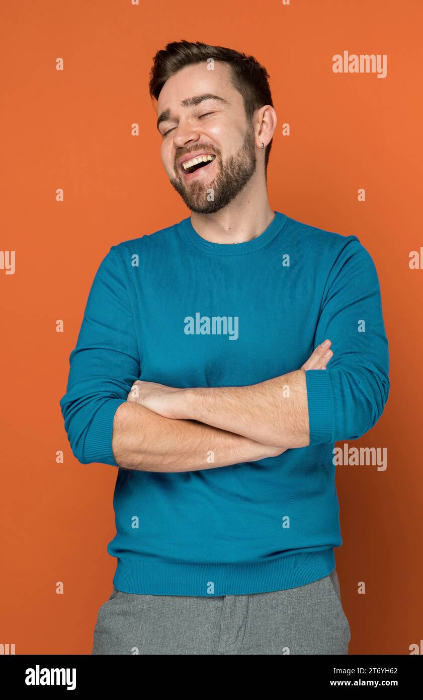 Smiley handsome man posing hi-res stock photography and images - Alamy