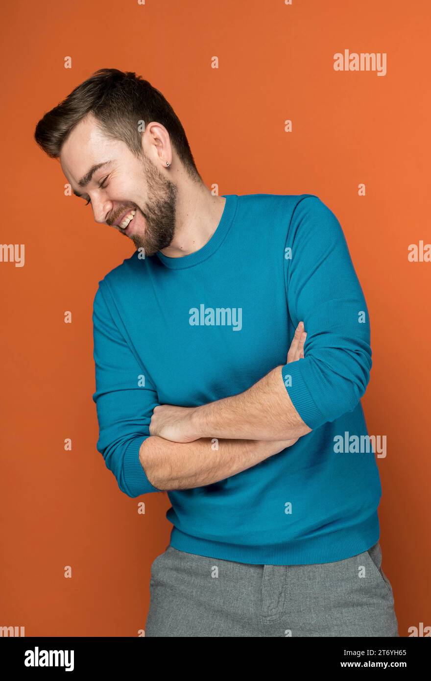 Smiley handsome man posing hi-res stock photography and images - Alamy