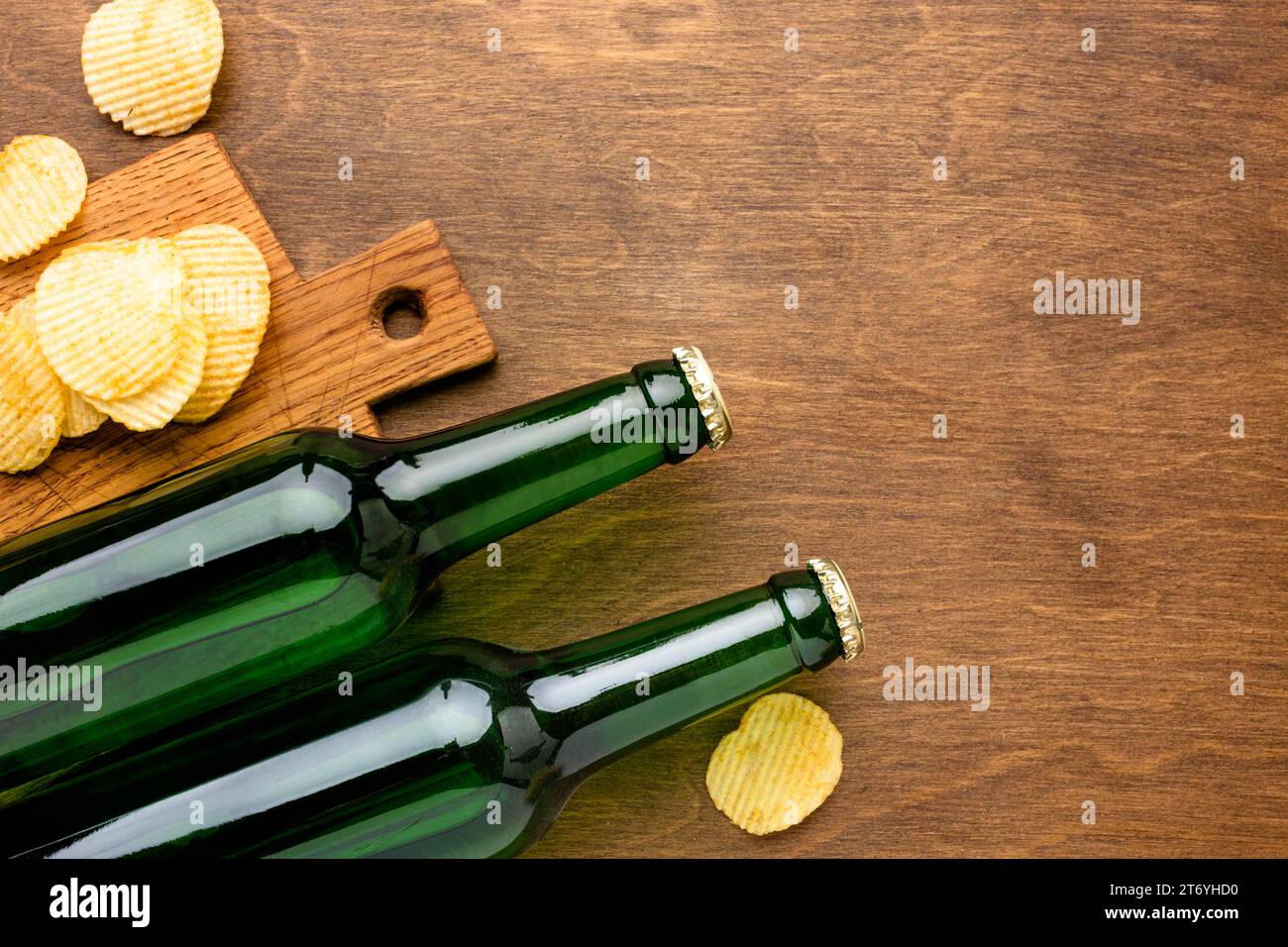 Top view beer bottles with chips Stock Photo - Alamy