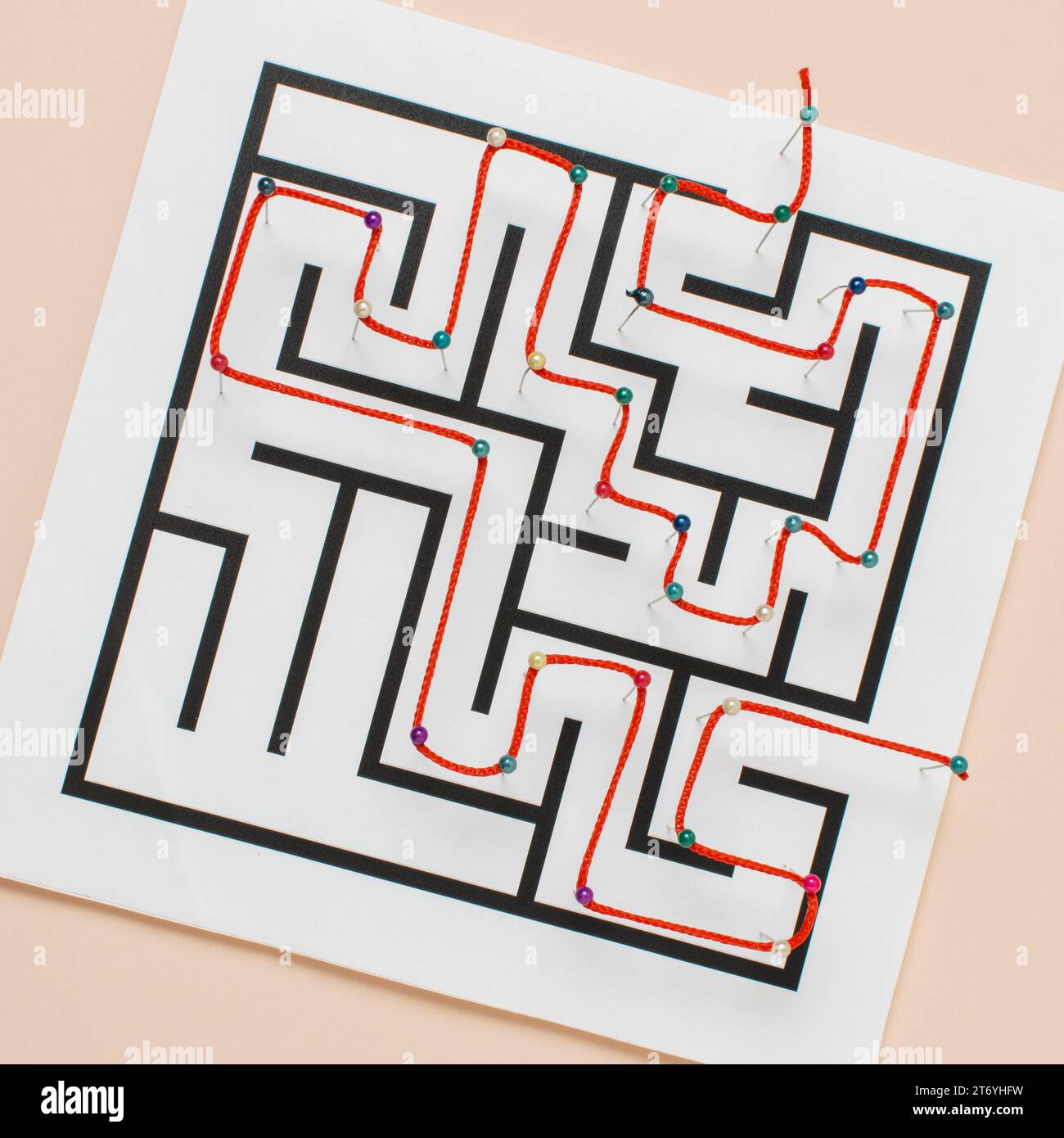 Top view maze paper with thread Stock Photo - Alamy