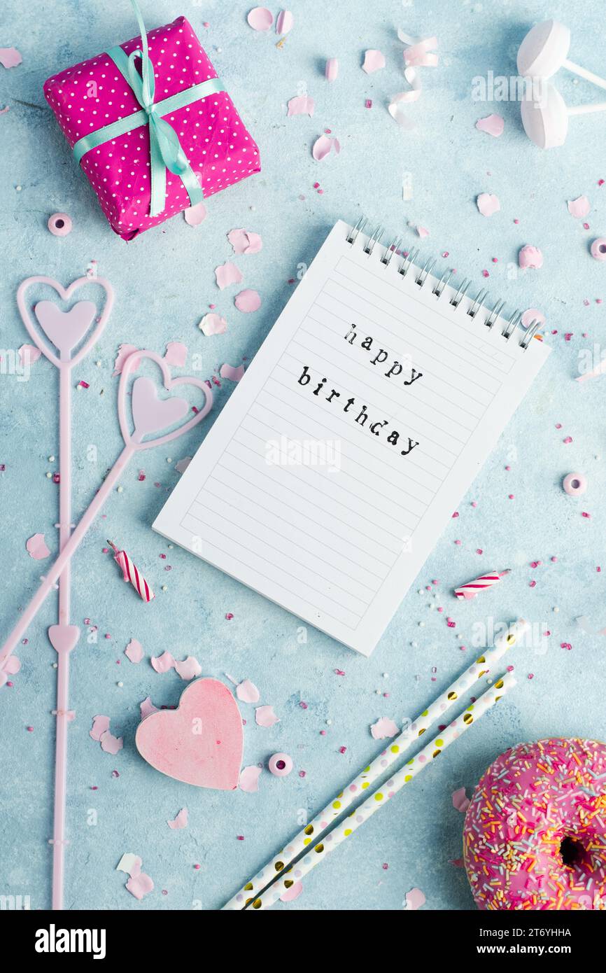 Top view notebook with happy birthday wish present Stock Photo - Alamy