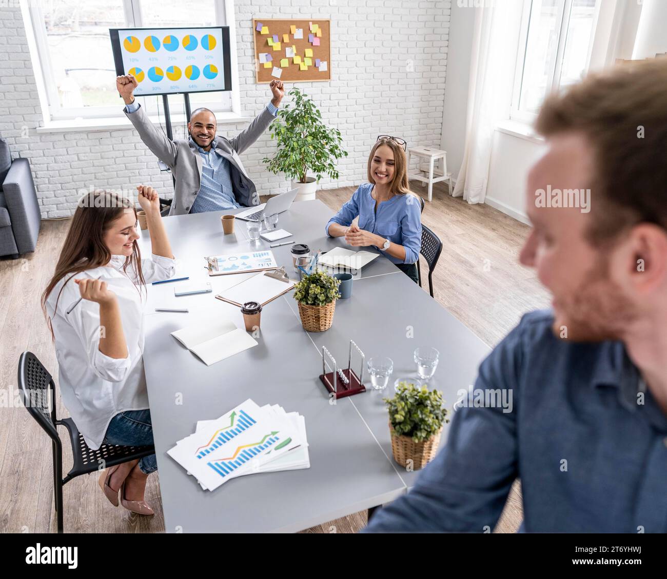 Young multicultural people collaborating hi-res stock photography and ...