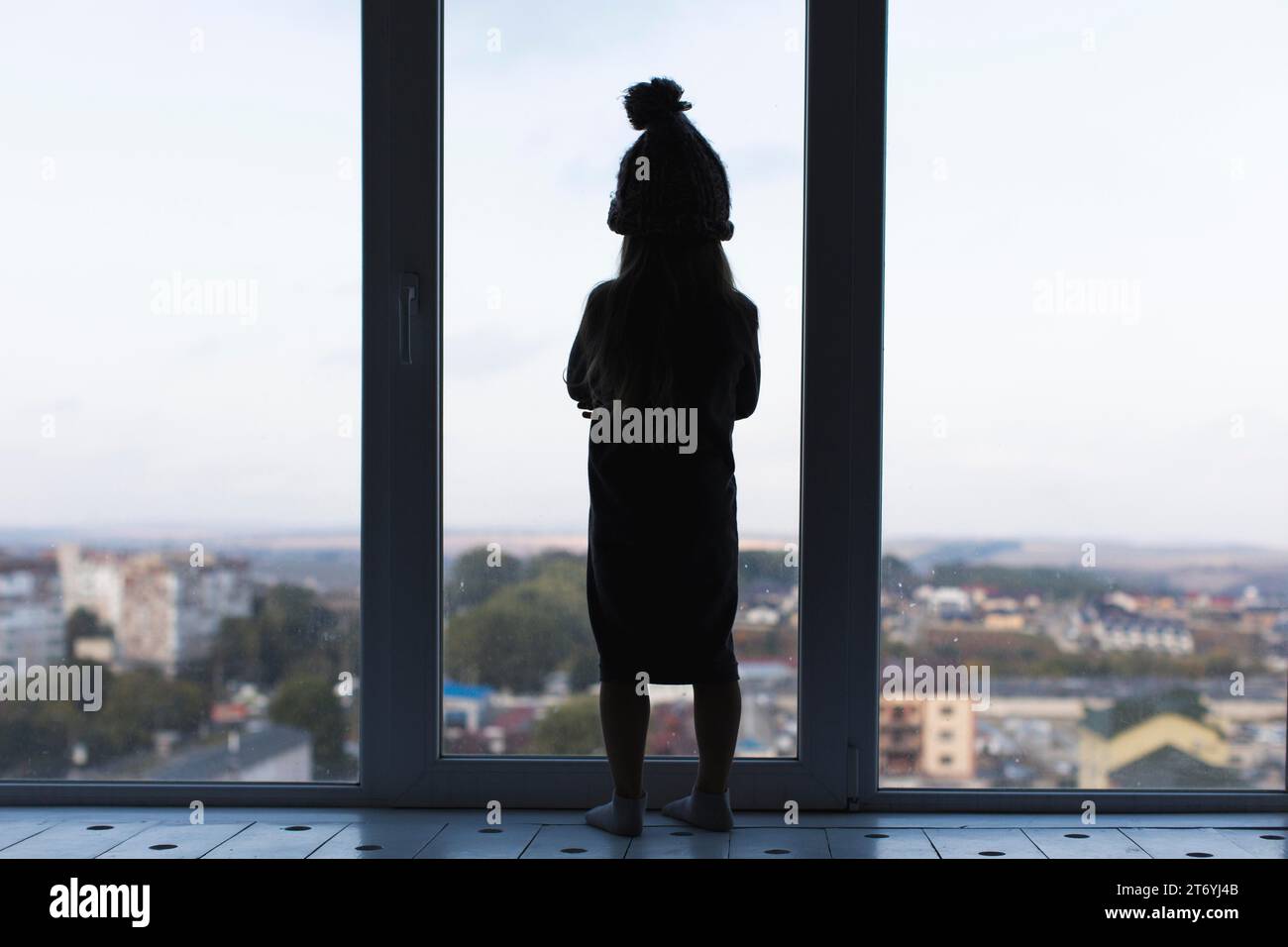 Artistic little girl window Stock Photo - Alamy