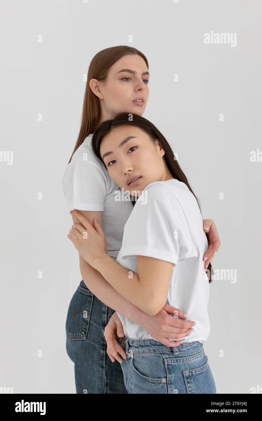 Beautiful different women posing together Stock Photo - Alamy