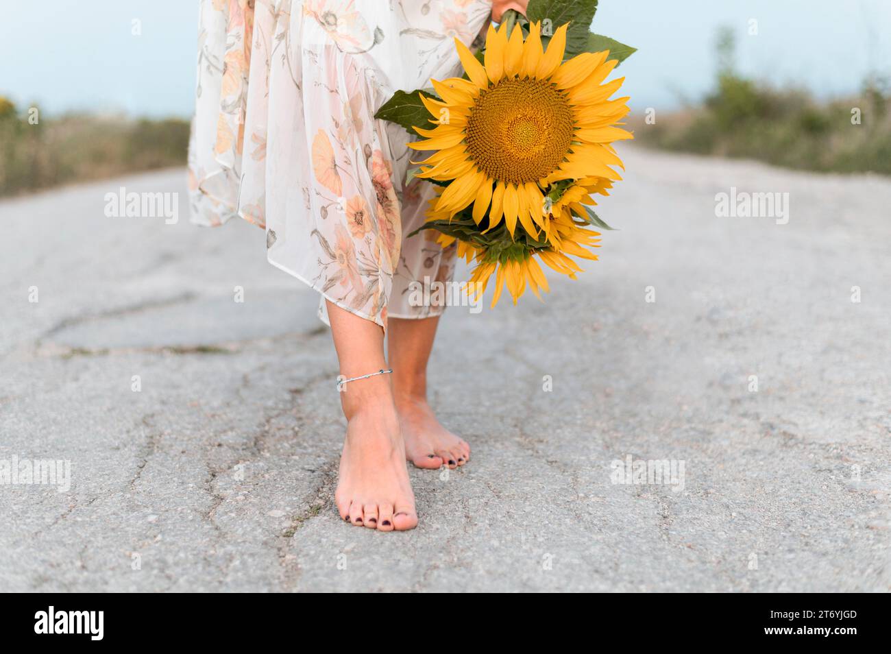 Close up barefoot woman ground Stock Photo - Alamy