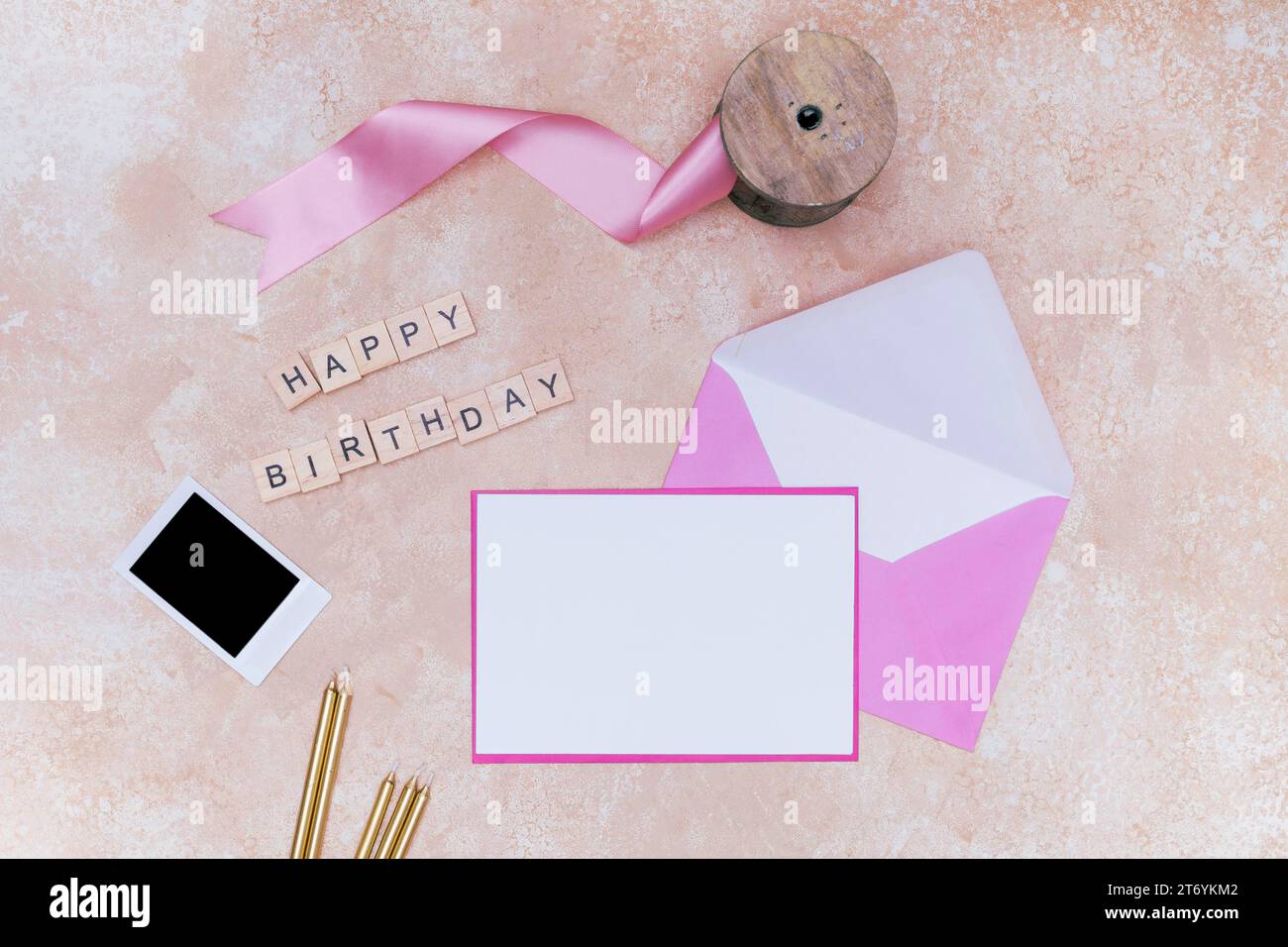 Girly birthday items pink marble background Stock Photo - Alamy
